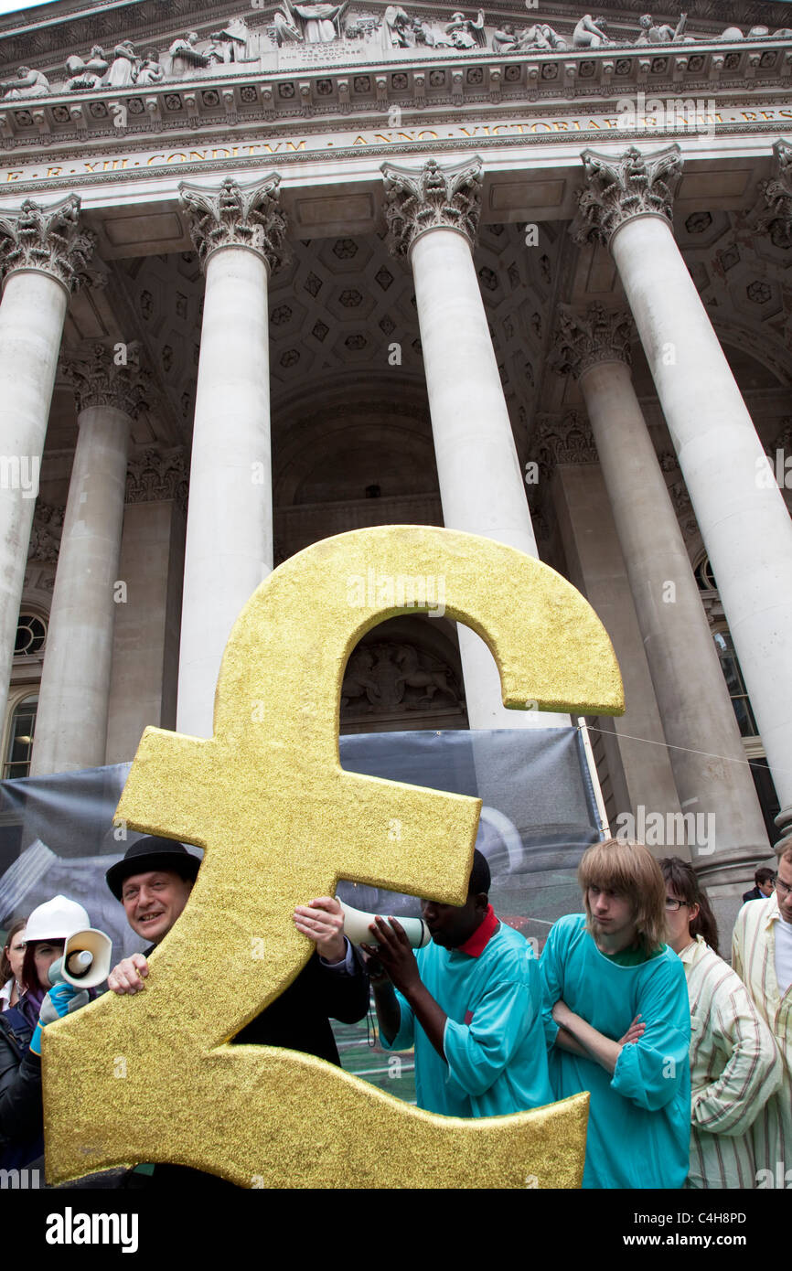 Robin Hood Tax supporters protest at the Royal Exchange in the City of ...
