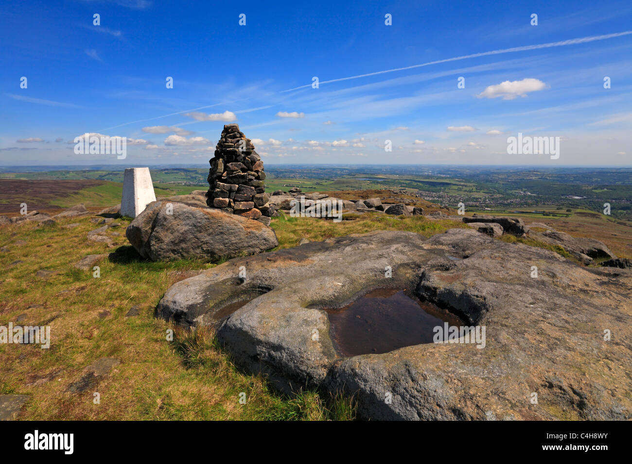 Gritstone rocks below the cairn and trig point on West Nab near ...