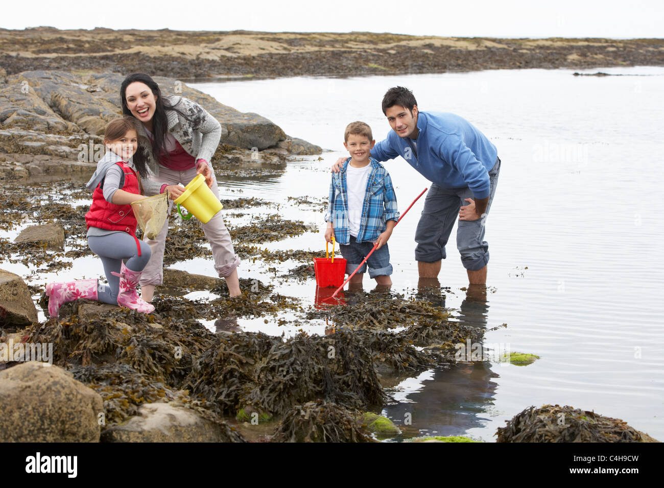 Collecting Shells At The Beach High Resolution Stock Photography and ...