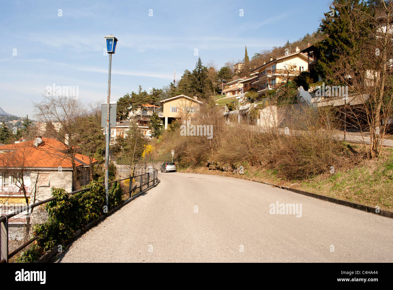 Asphalt road bending in a circle Stock Photo - Alamy