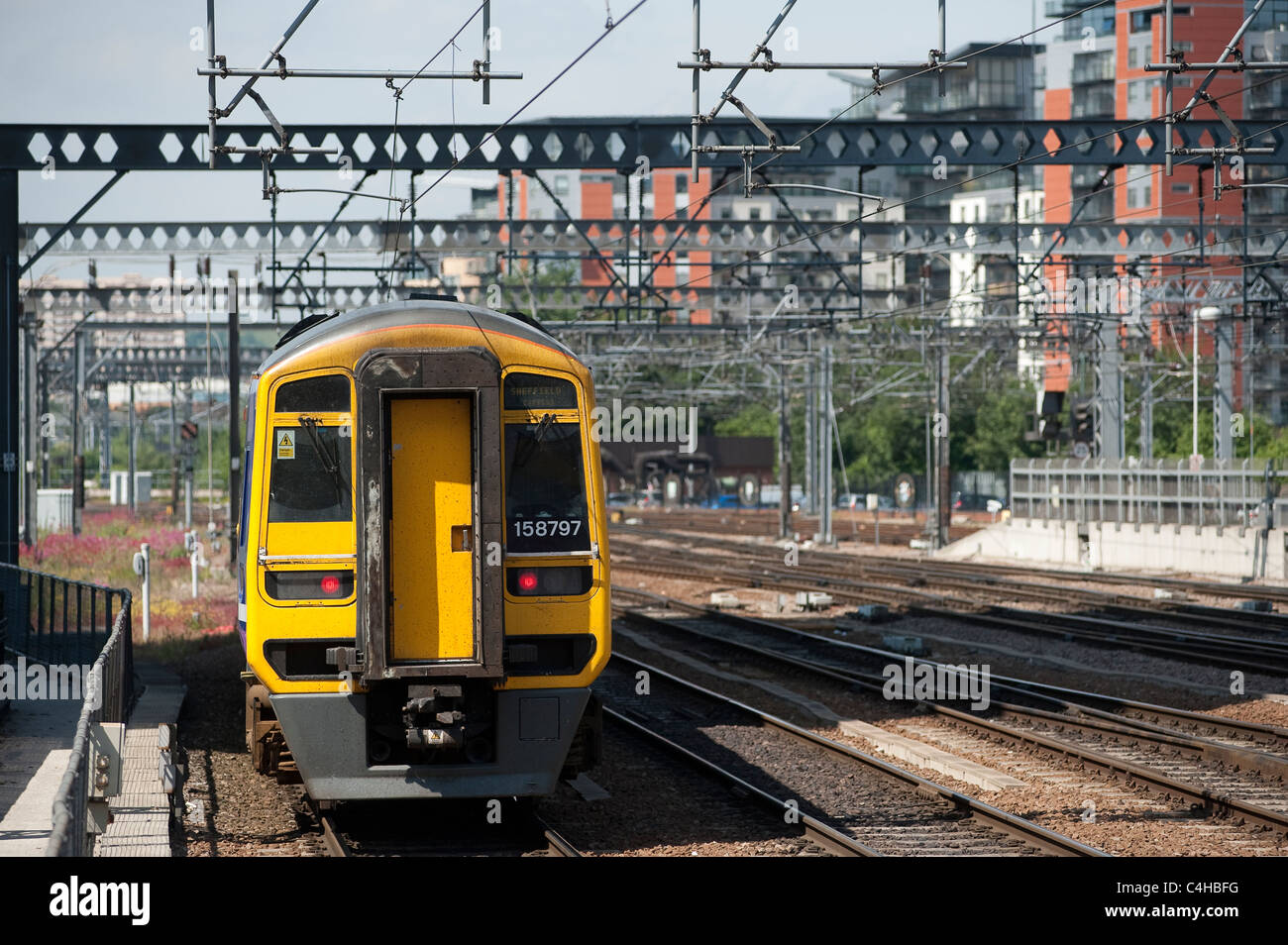 Class 158 train in Northern Rail livery leaving a railway station in ...