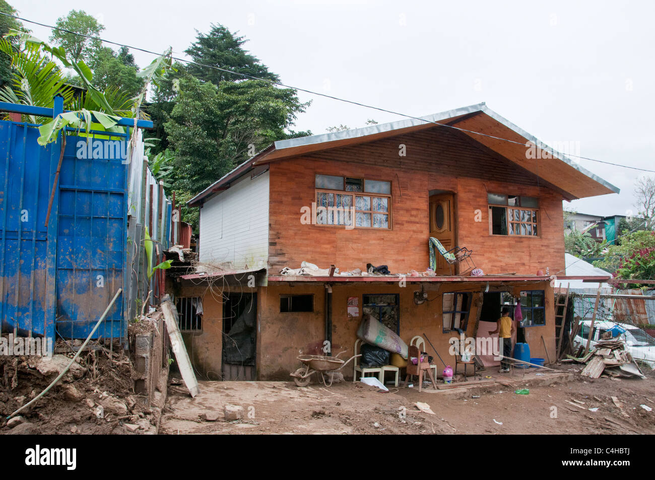 House damaged from a landslide hi-res stock photography and images - Alamy