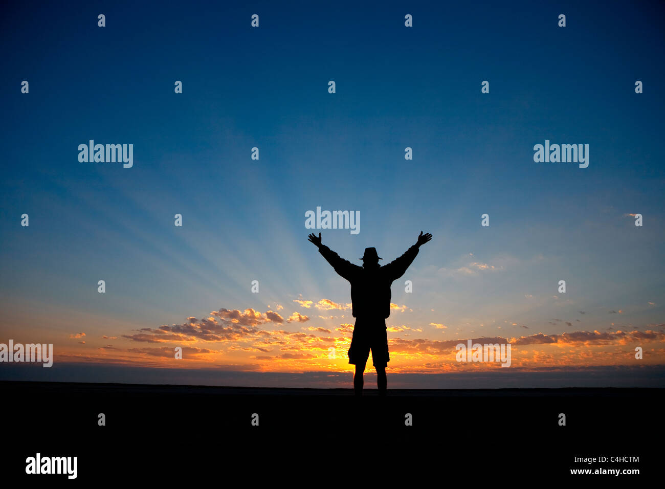 Sunset in Piper Pan, Central Kalahari Game Reserve, Botswana Stock ...