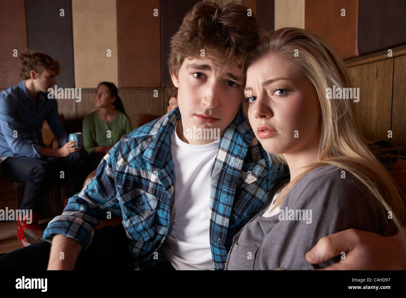 Worried young couple Stock Photo - Alamy