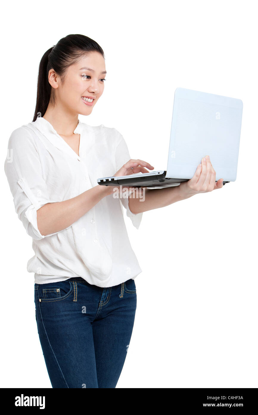 Woman typing computer back view Cut Out Stock Images & Pictures - Alamy