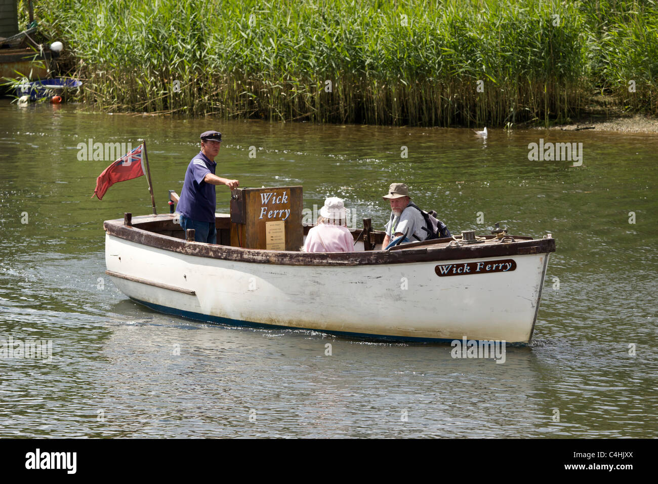 Wick passenger small ferry crossing river Stour between Wick Village ...