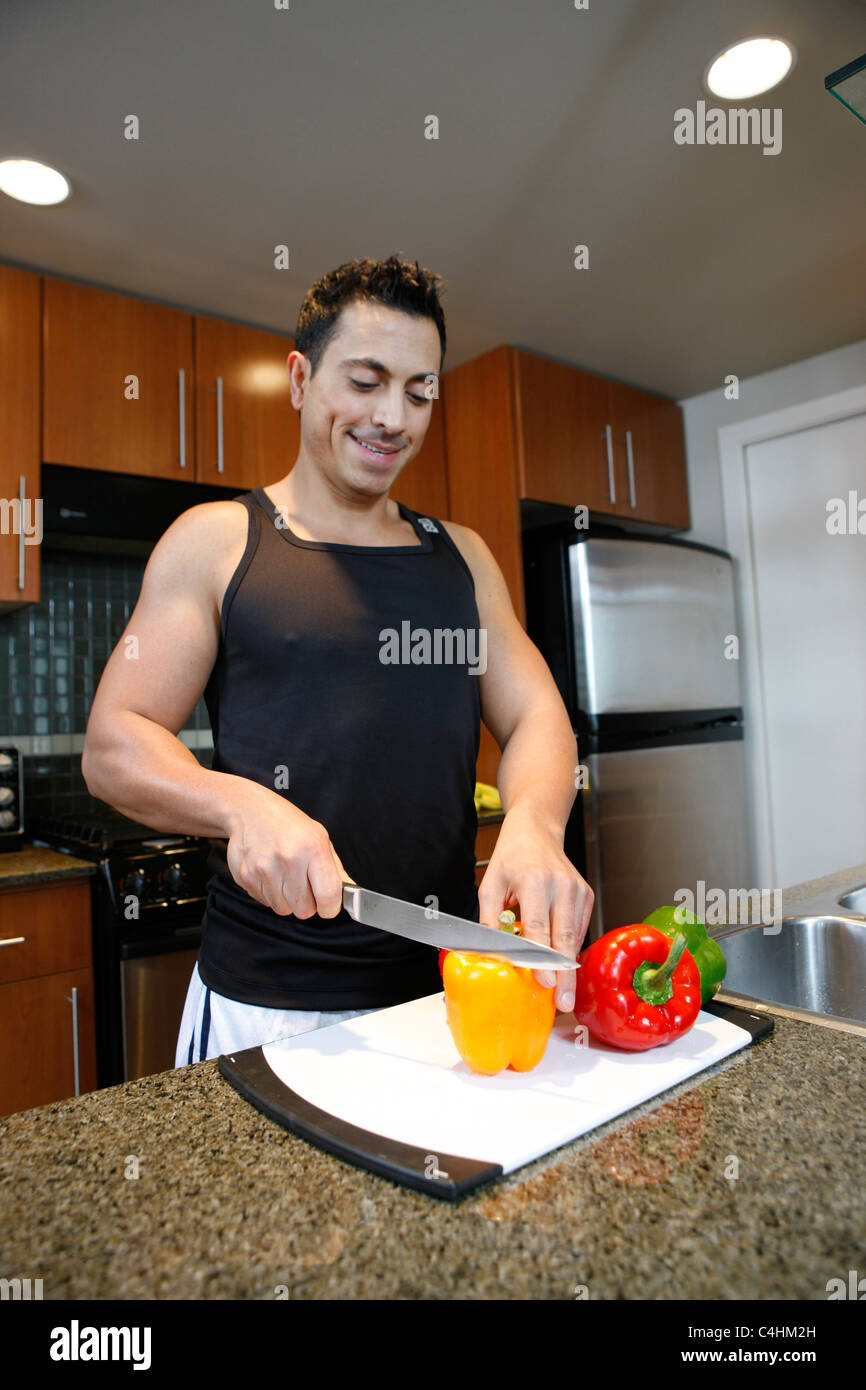 Man eating vegetable muscular hi-res stock photography and images - Alamy