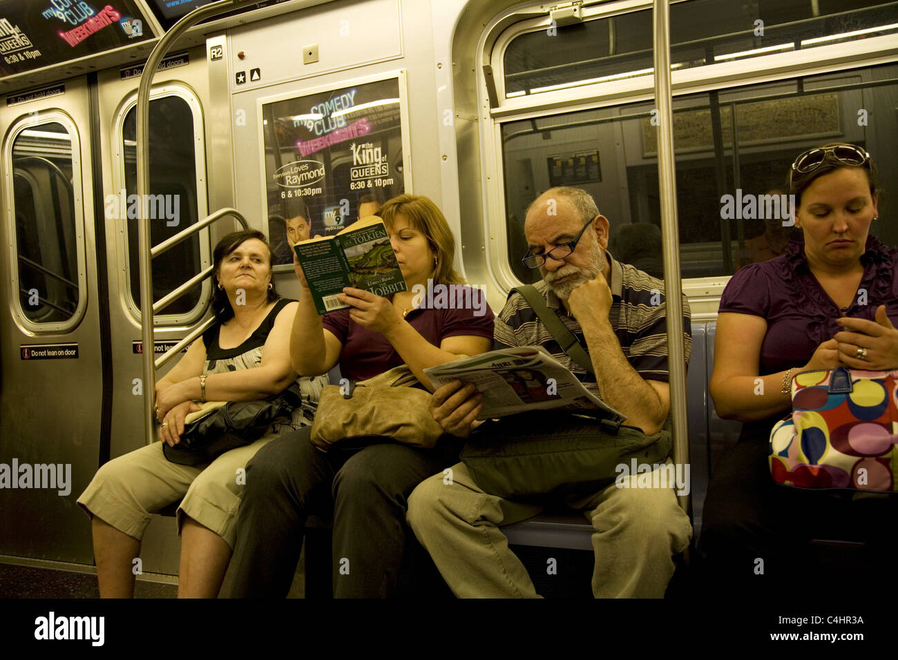 Subway riders in New York City Stock Photo - Alamy