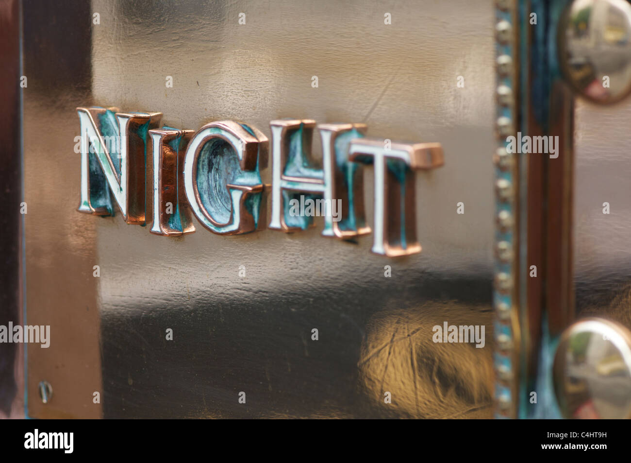 Night brass lettering Stock Photo - Alamy