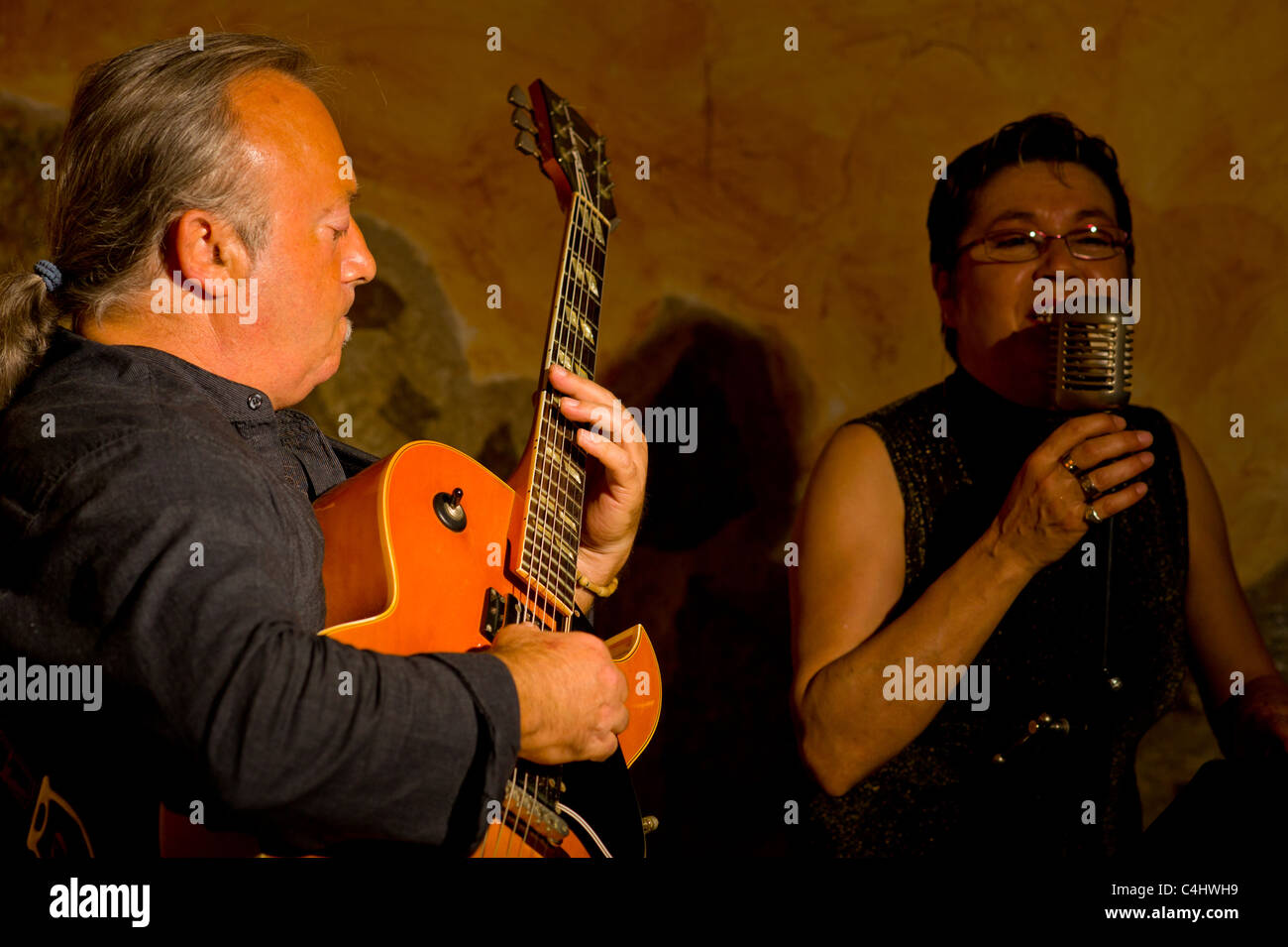 Classic jazz duet performing with stage lighting Stock Photo - Alamy