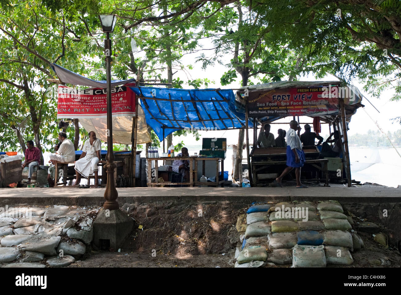 Fishmonger stalls, Fort Cochin, Kerala, India Stock Photo - Alamy