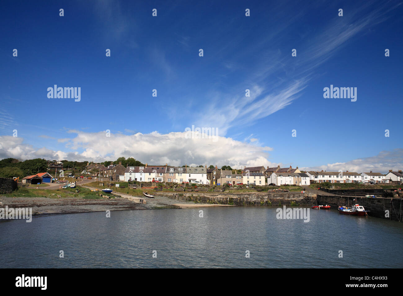 Bright blue sky over Craster harbour, Northumberland, North East ...
