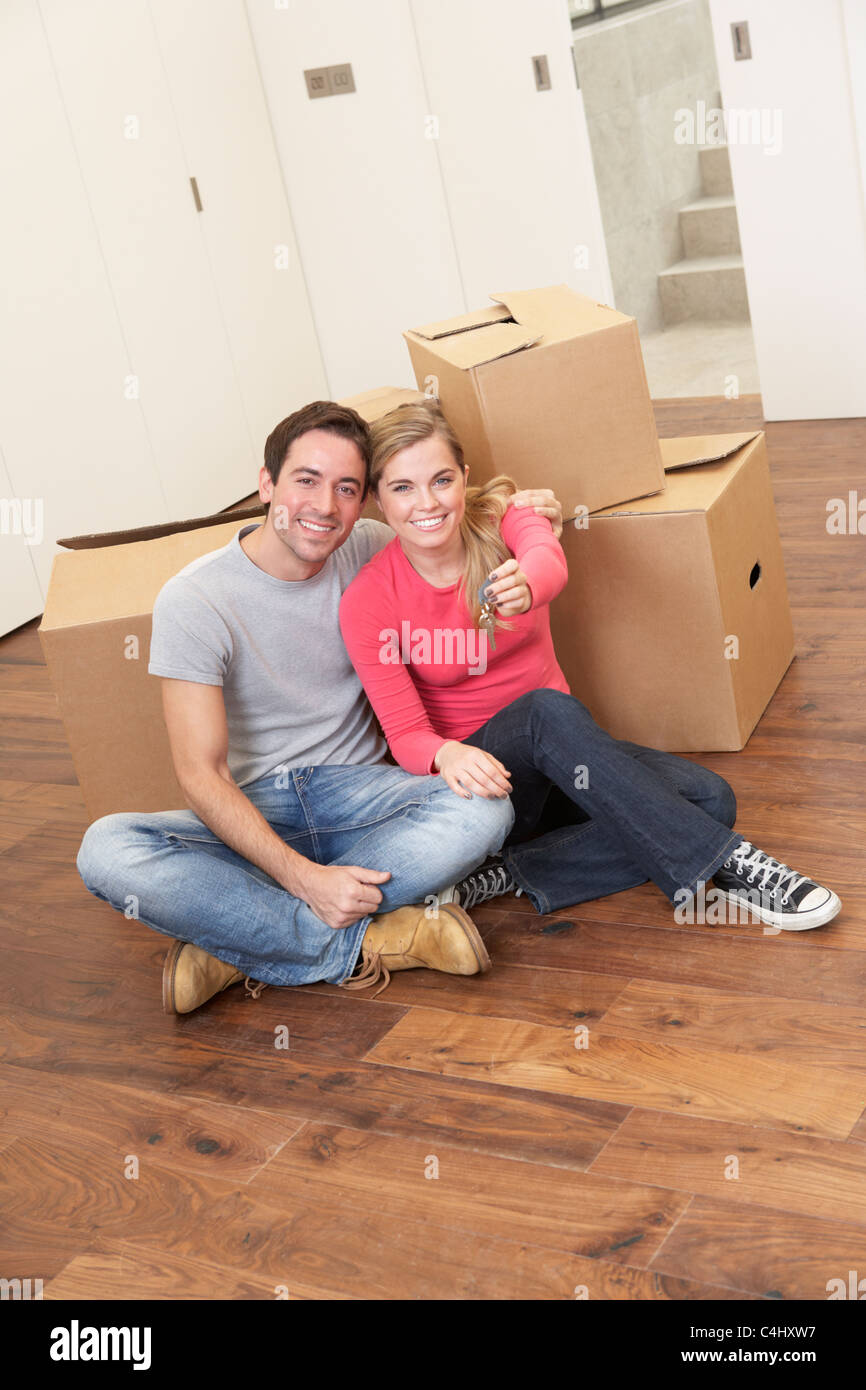 Man sitting cardboard boxes hi-res stock photography and images - Alamy
