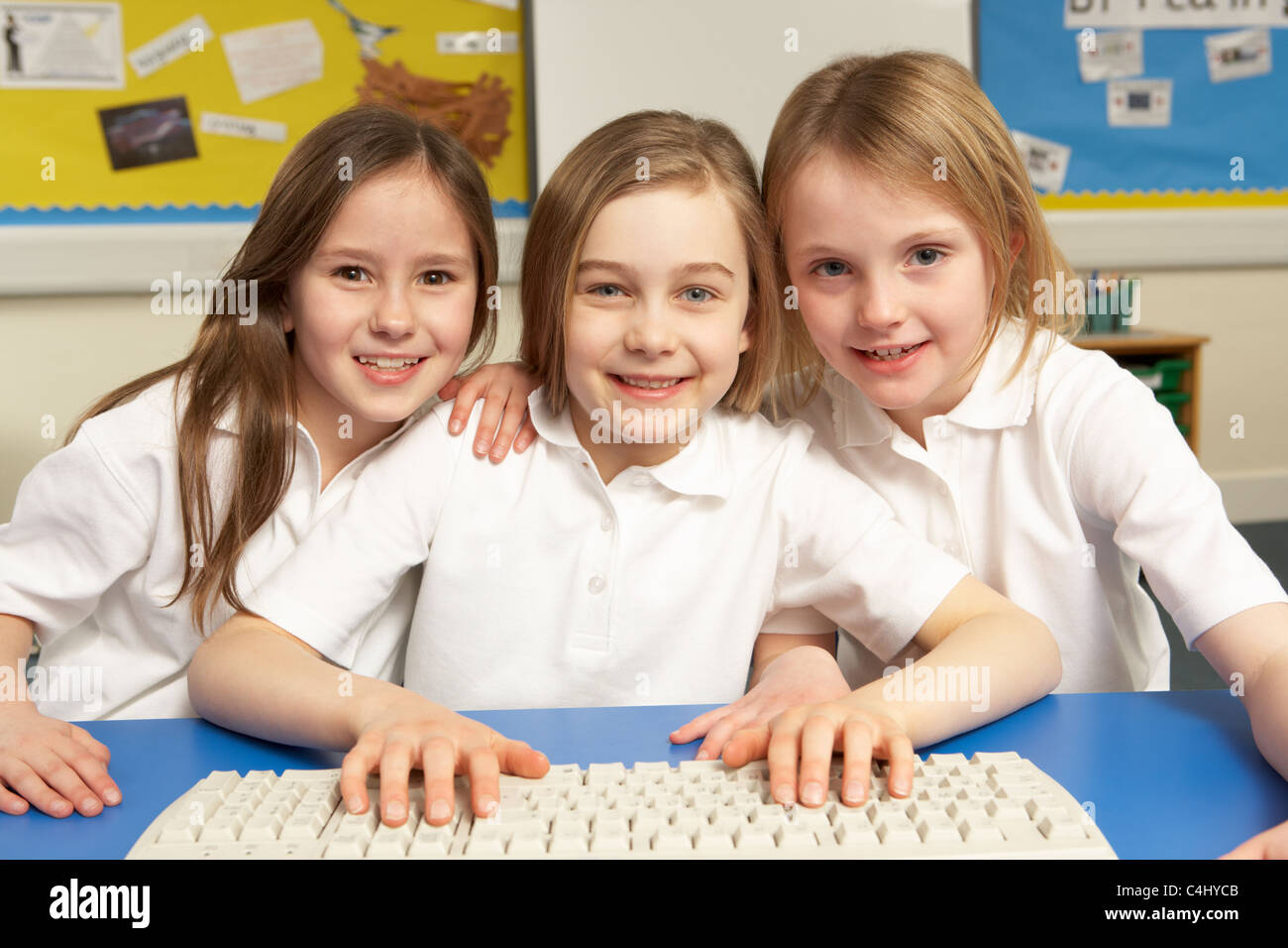Schoolchildren in IT Class Using Computers Stock Photo - Alamy