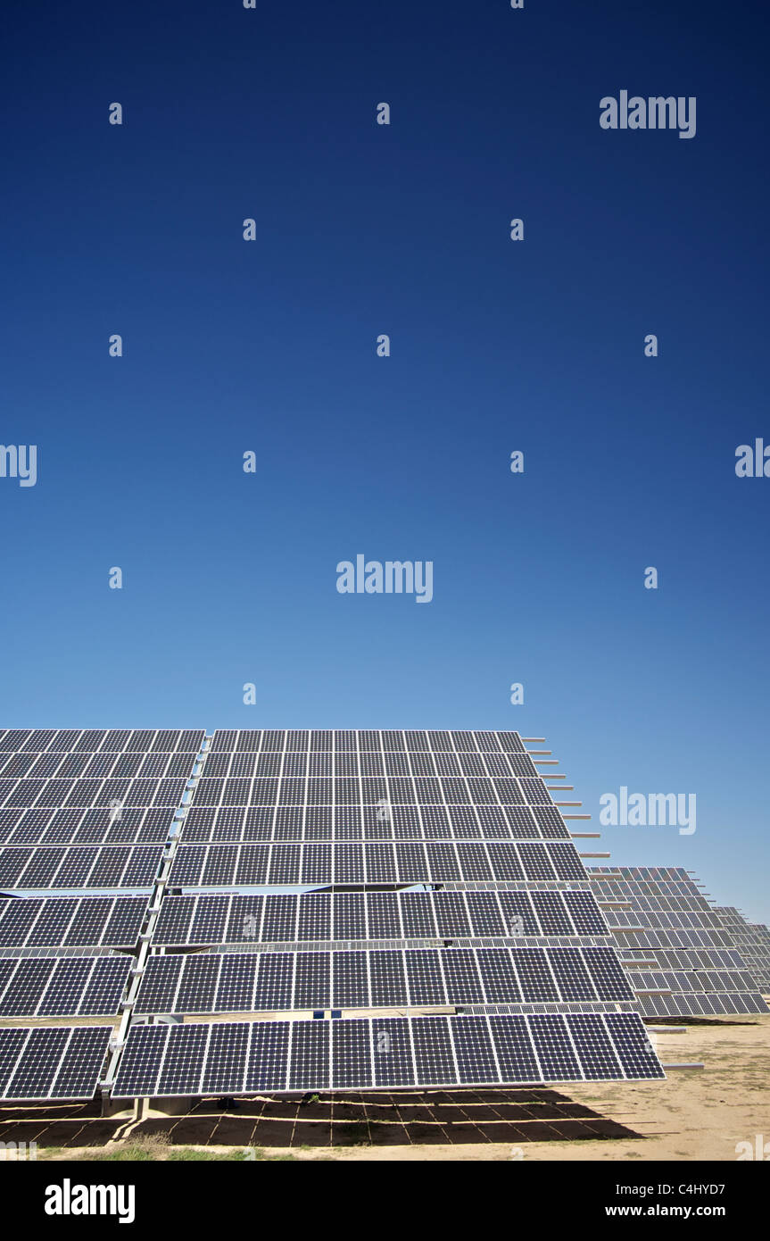 large solar panels with clear blue sky Stock Photo - Alamy