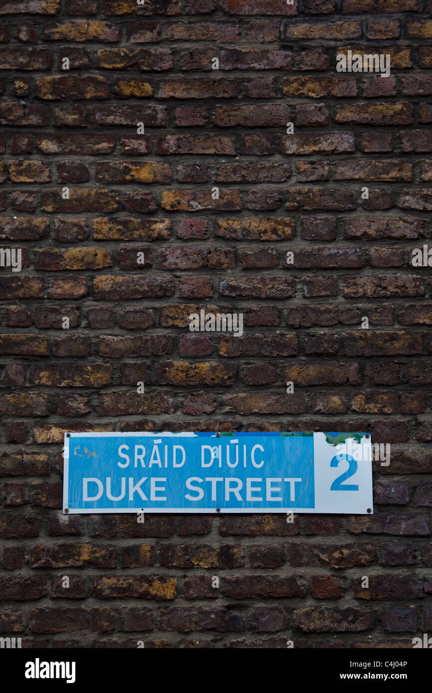 Official street sign for Duke St. on redbrick wall in Dublin city ...