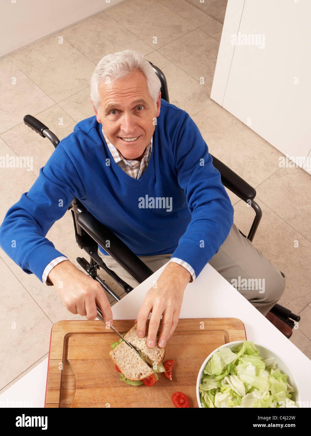 Disabled Senior Man Making Sandwich In Kitchen Stock Photo - Alamy