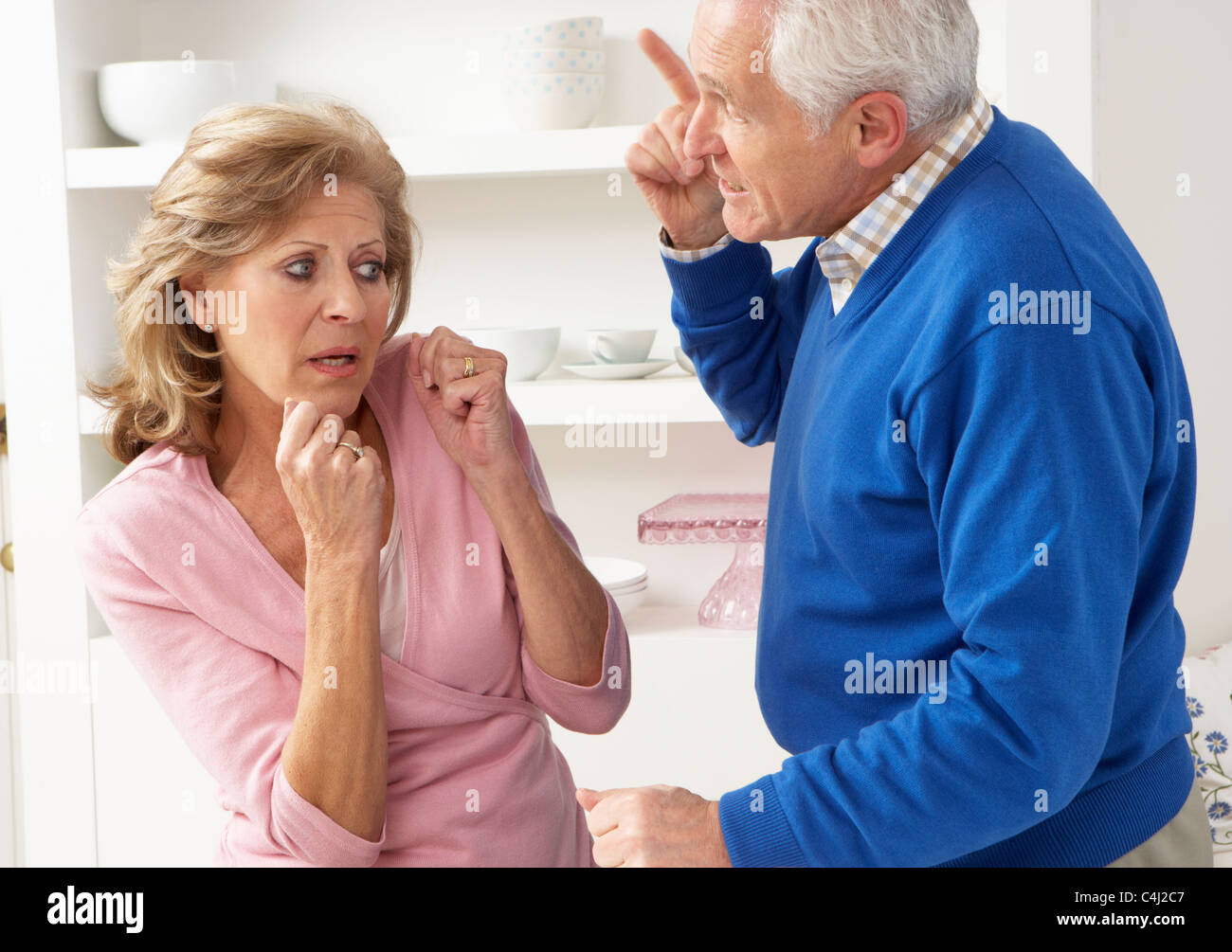 Senior Couple Having Argument At Home Stock Photo - Alamy