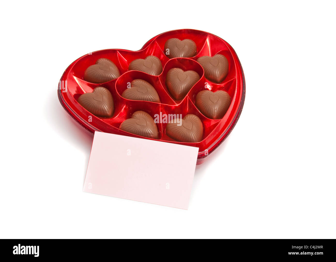 chocolate heart shape on white background with message card Stock Photo ...