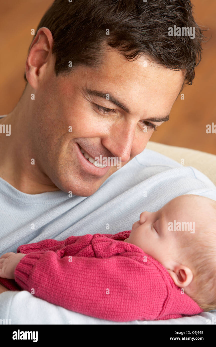 Portrait Of Father With Newborn Baby At Home Stock Photo - Alamy