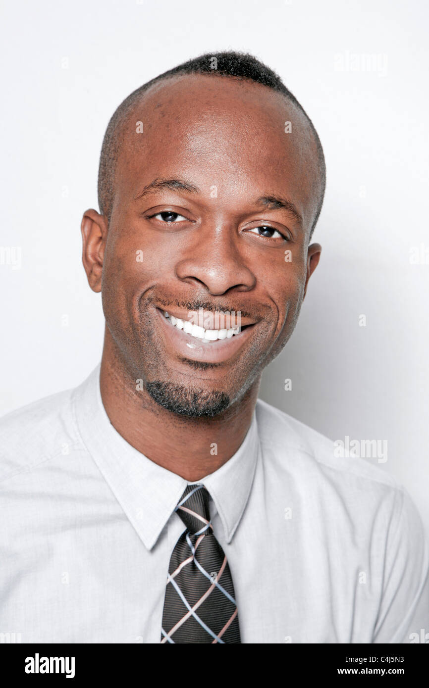 Young African Business Man Smiling Stock Photo - Alamy
