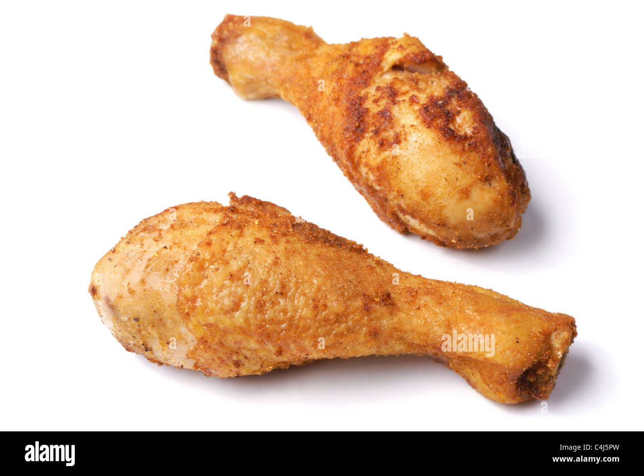 Fried chicken legs on the white background Stock Photo - Alamy