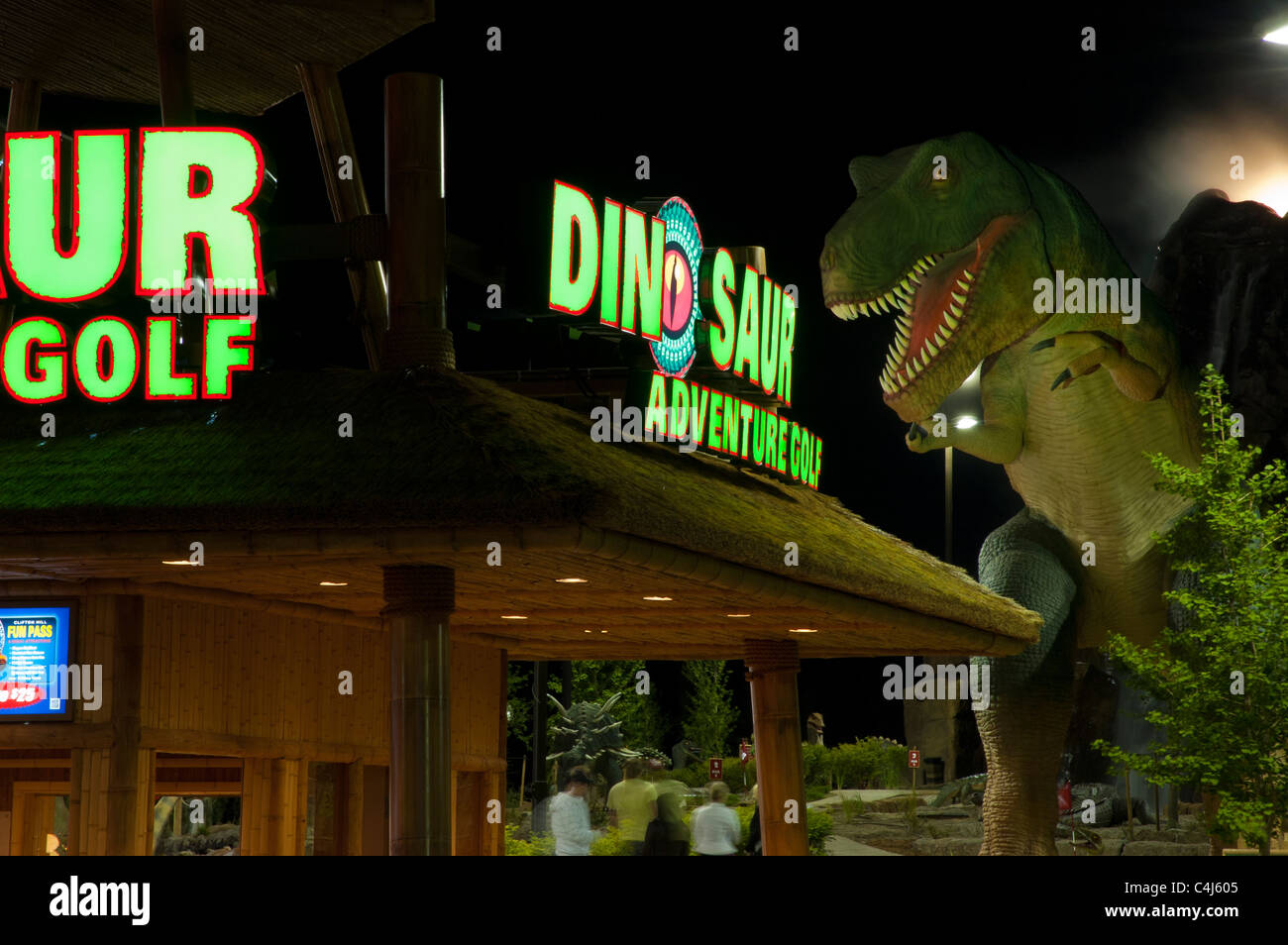 Dinosaur adventure mini-golf course at night, Clifton Hill, Niagara ...
