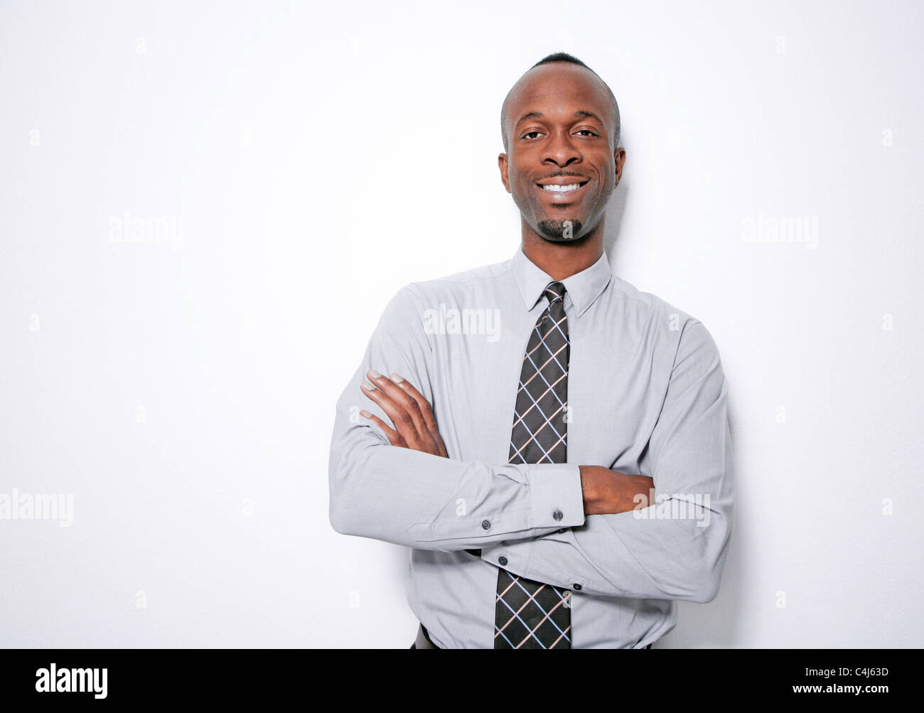 Young African Business Man Smiling Stock Photo - Alamy