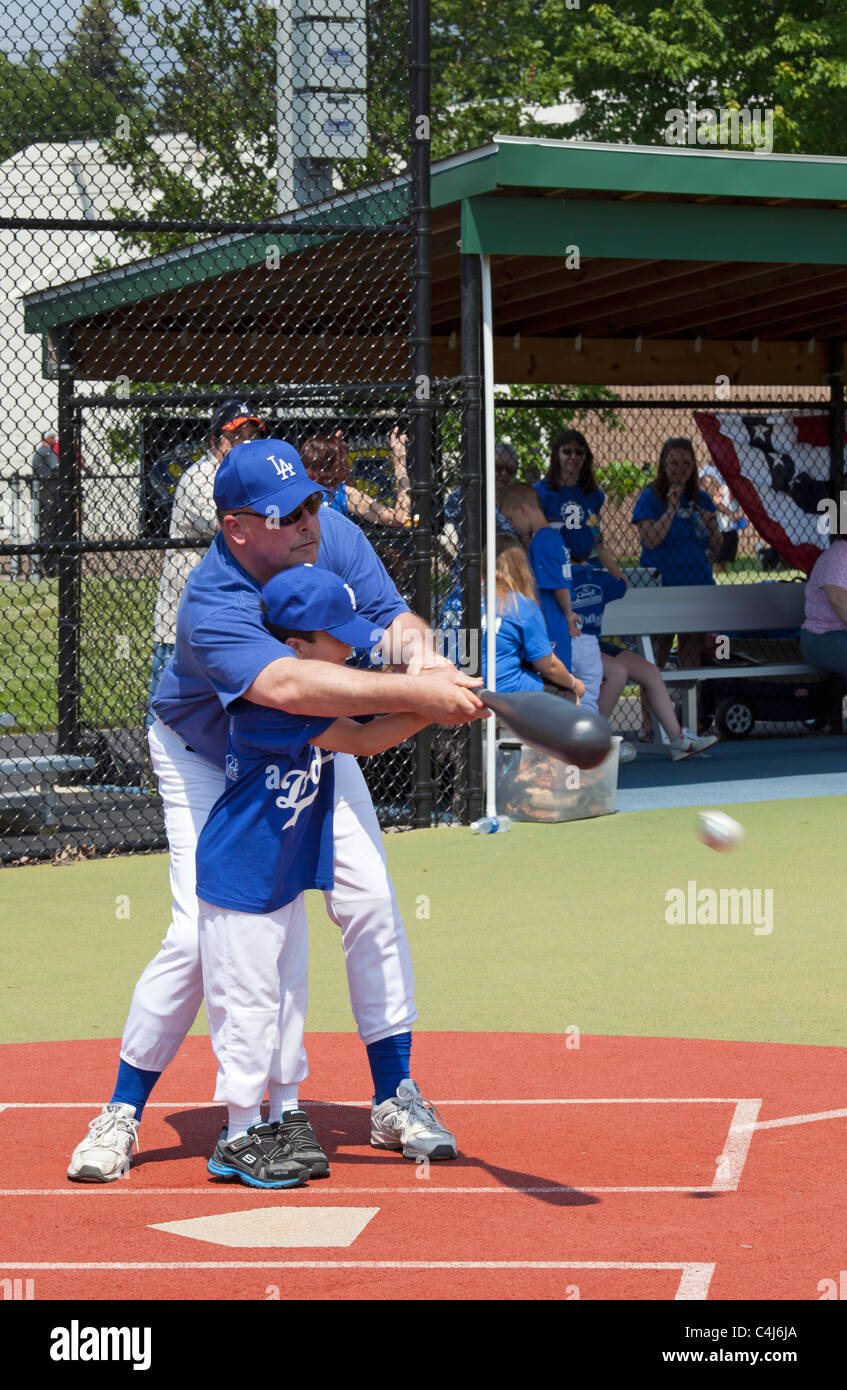 Helping disabled play sport hi-res stock photography and images - Alamy