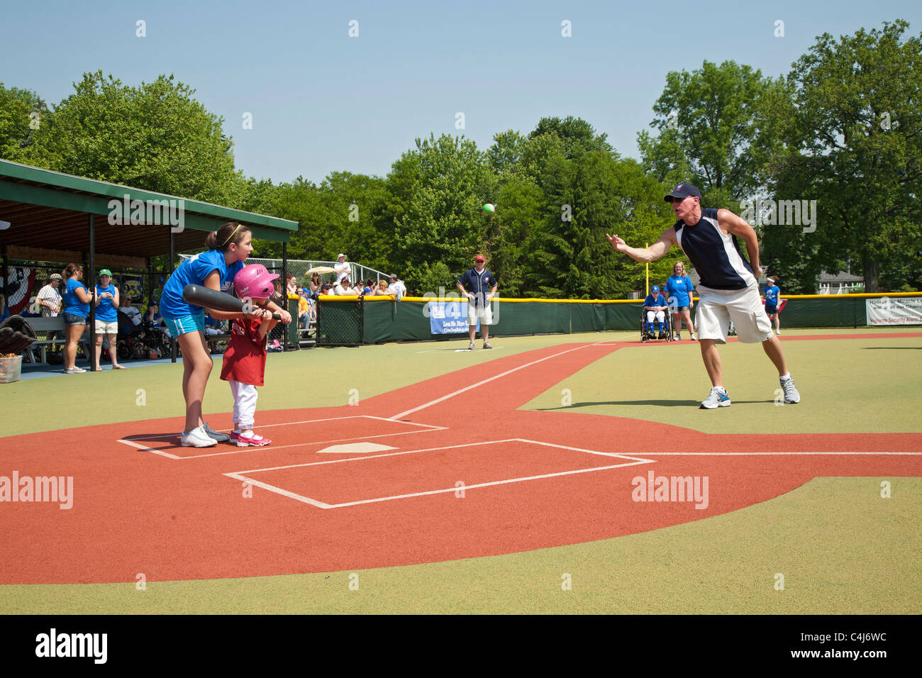 Helping disabled play sport hi-res stock photography and images - Alamy