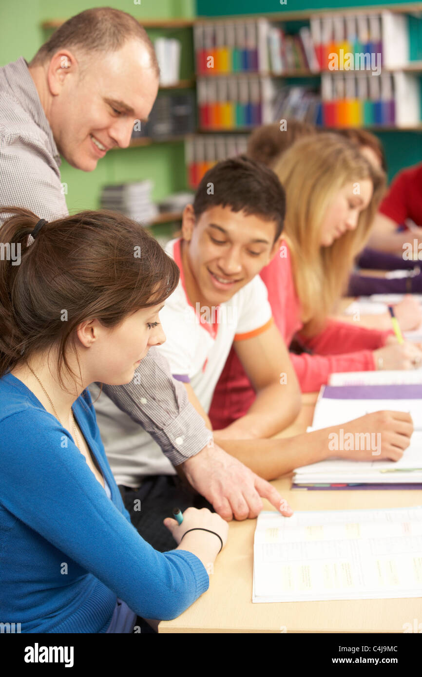 Female teacher lecturing to students hi-res stock photography and ...