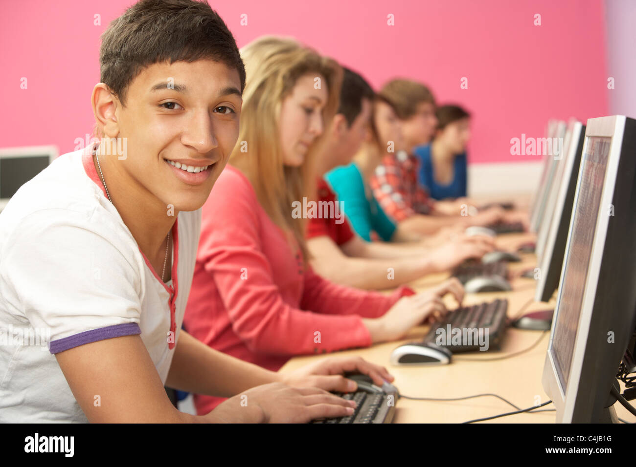 Teenage Students In IT Class Using Computers In Classroom Stock Photo ...