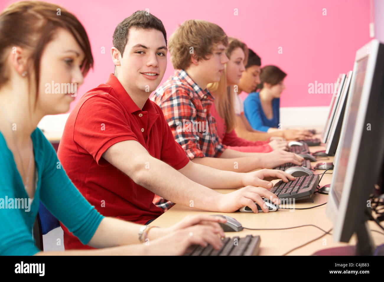 Teenage Students In IT Class Using Computers In Classroom Stock Photo ...