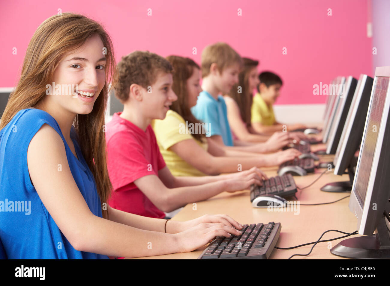 Teenage Students In IT Class Using Computers In Classroom Stock Photo ...