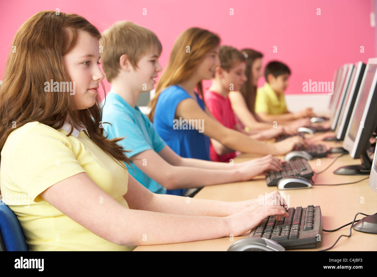 Teenage Students In IT Class Using Computers In Classroom Stock Photo ...