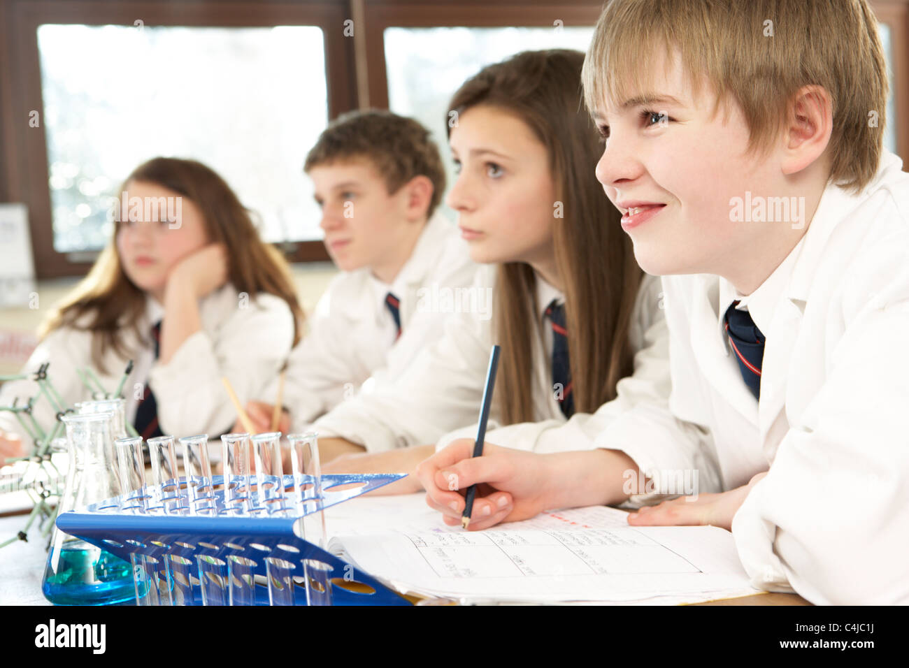 Group Of Teenage Students In Science Class Stock Photo - Alamy