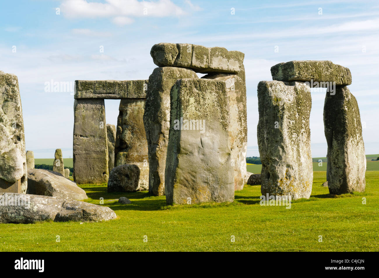 Bronze age standing stone with visitor hi-res stock photography and ...