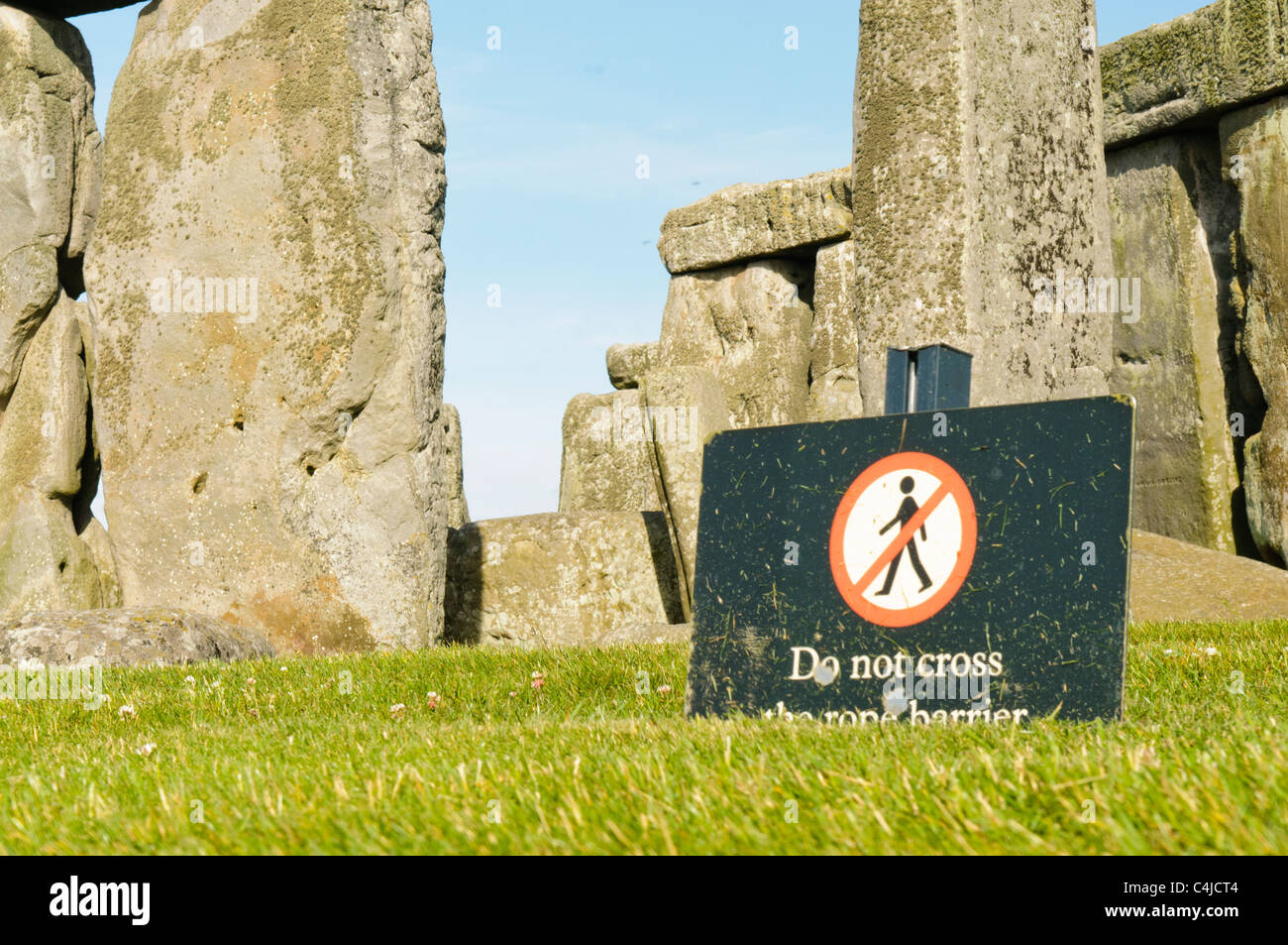 Sign at Stonehenge warning visitors not to approach the stones and stay ...