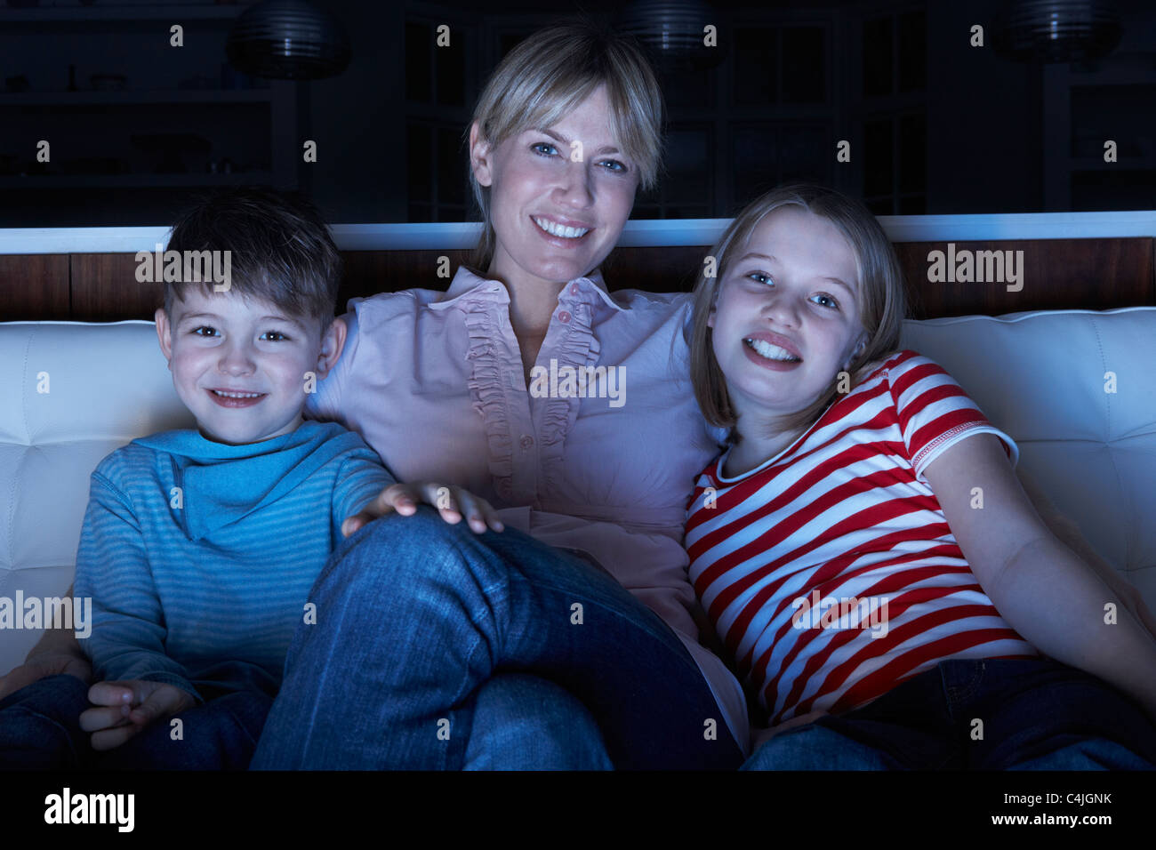 Children watching tv programme hi-res stock photography and images - Alamy