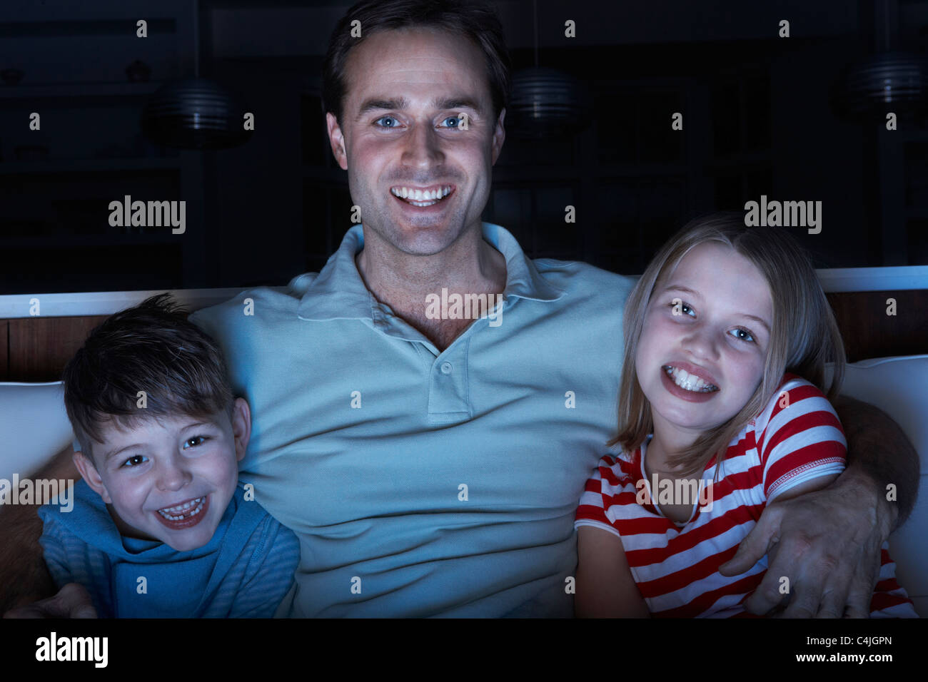 Children watching tv programme hi-res stock photography and images - Alamy