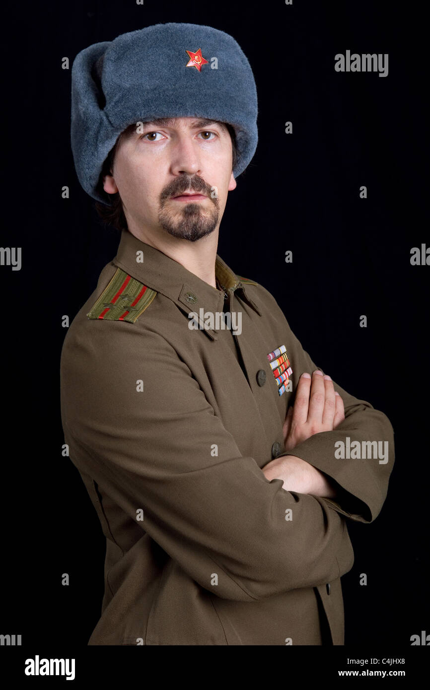 young man dressed as russian military, studio Stock Photo - Alamy