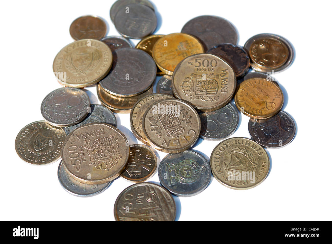 A bunch of coins of different currencies Stock Photo - Alamy