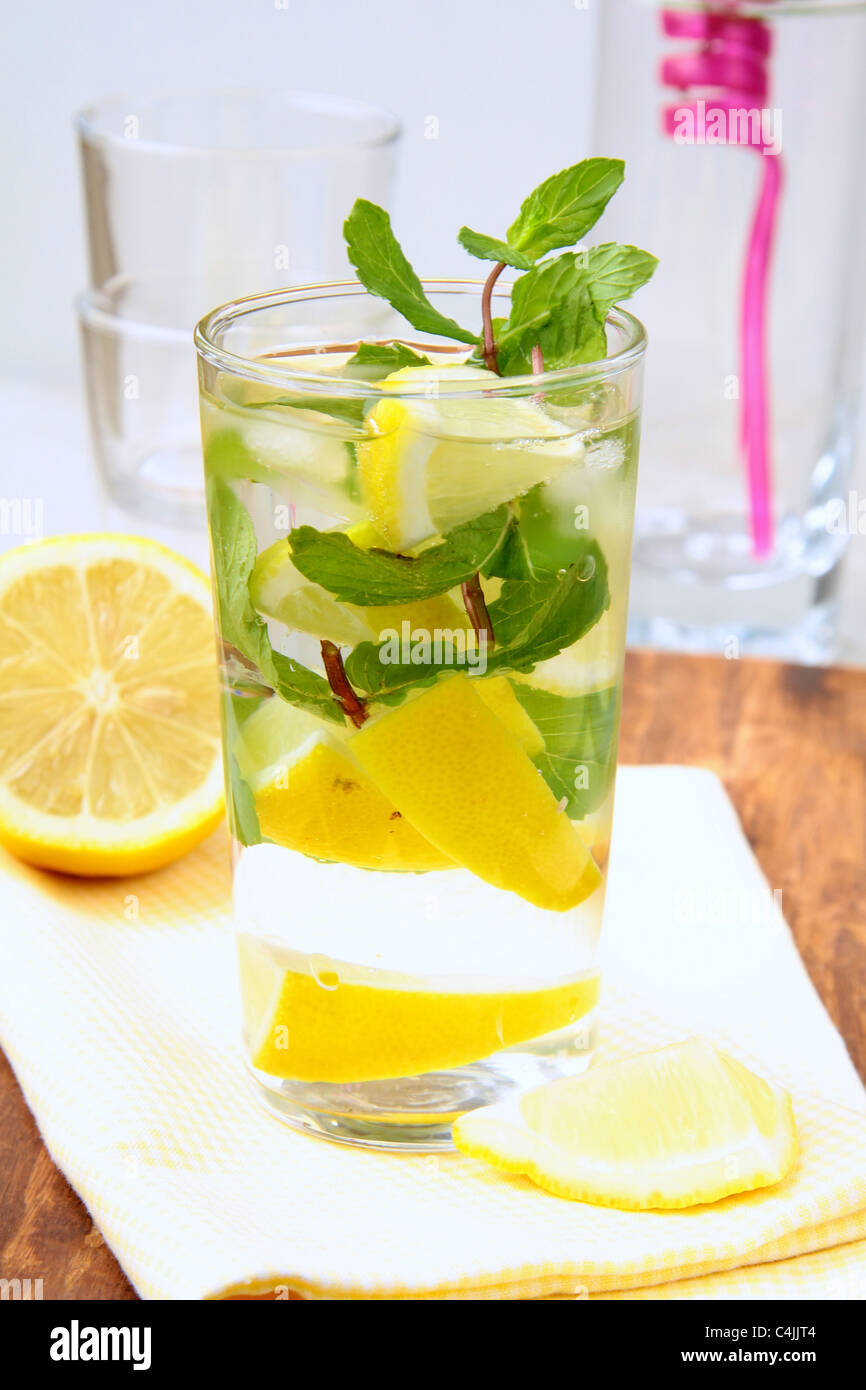 fresh lemon lemonade with mint leaves and ice Stock Photo - Alamy
