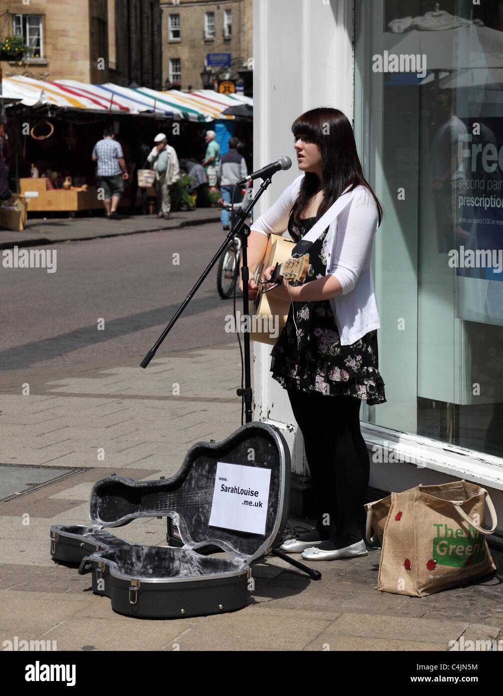 Busker on street corner Cambridge England Stock Photo - Alamy