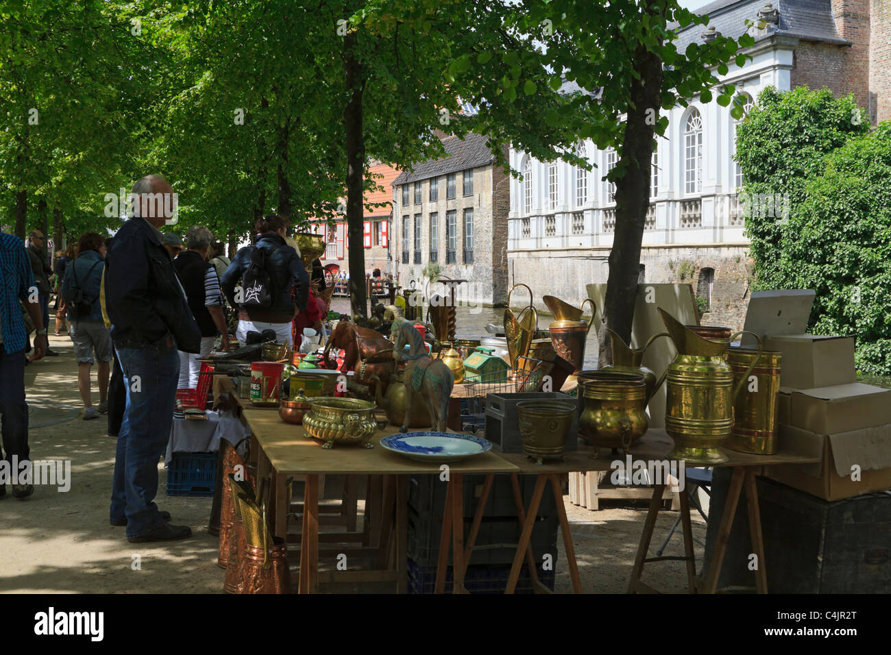 Twice weekly flea market beside the Dijver canal, Bruges, Belgium Stock ...