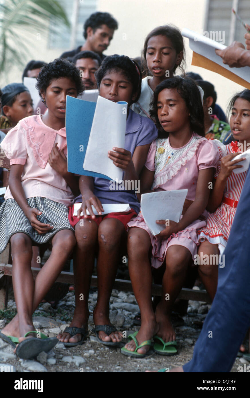 EAST TIMOR. CHILDREN AT CATHOLIC CHOIR AND PRAYER GROUP AT VIQUEQUE ...