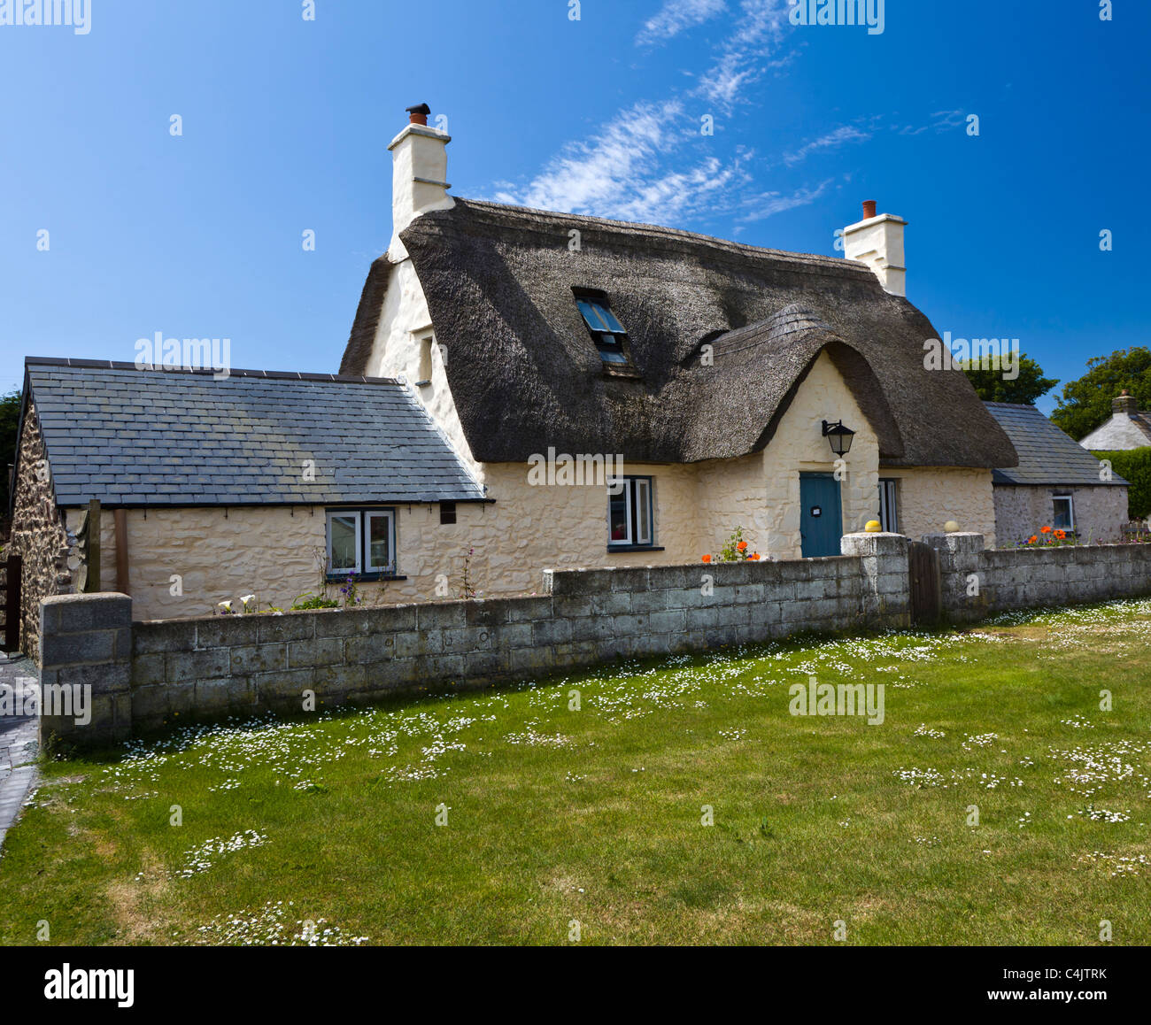 A pretty thatched cottage in the centre of Marloes in Pembrokeshire ...