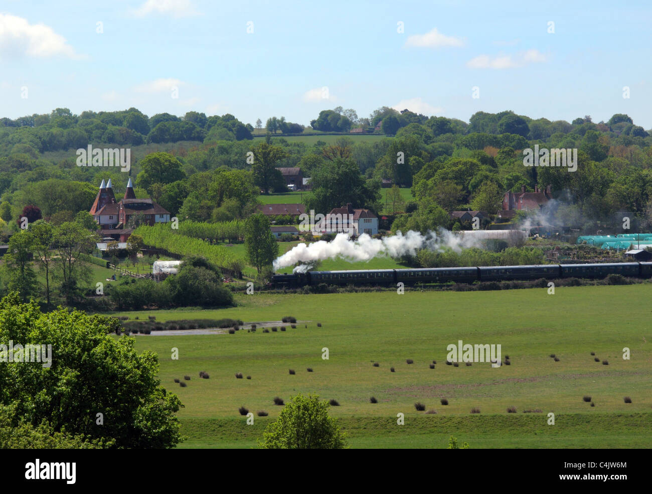 Steam train travels across the sussex countryside hi-res stock ...