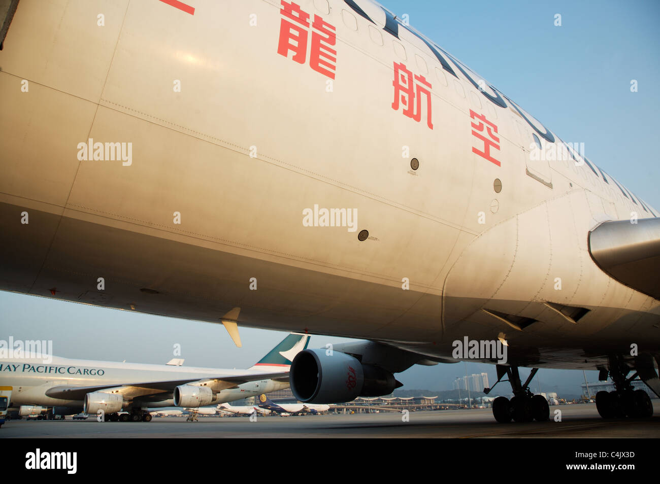 Dragonair plane livery tailfin tail logo Stock Photo - Alamy