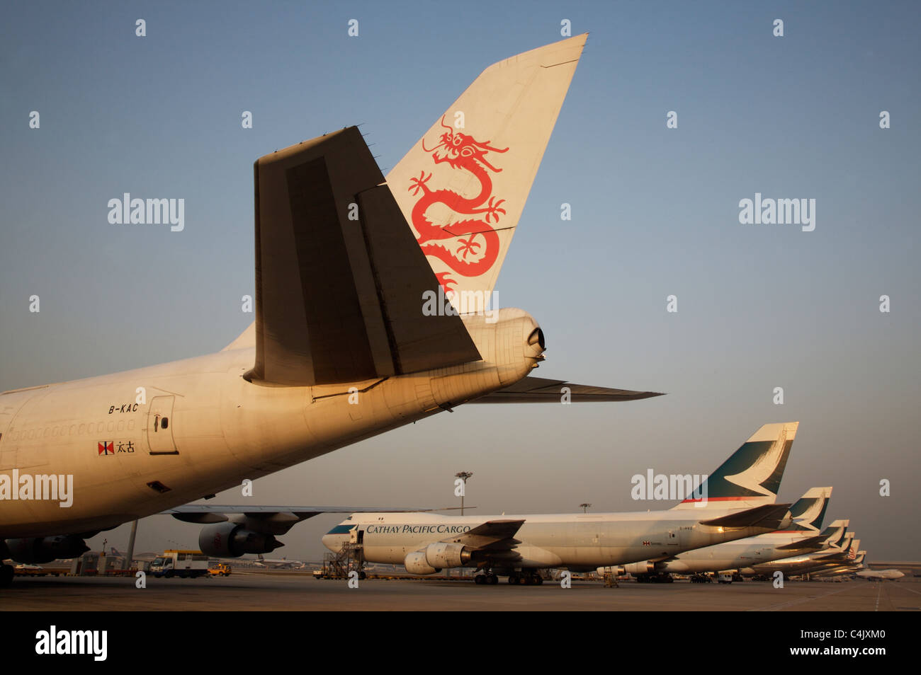 Cathay pacific eastern airlines planes tailplanes Stock Photo - Alamy